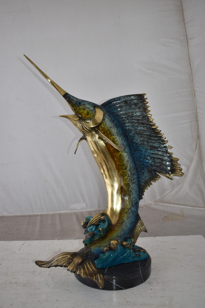 Gold And Blue Sailfish Swimming In Ocean Bronze Statue Size: 18" x 16"